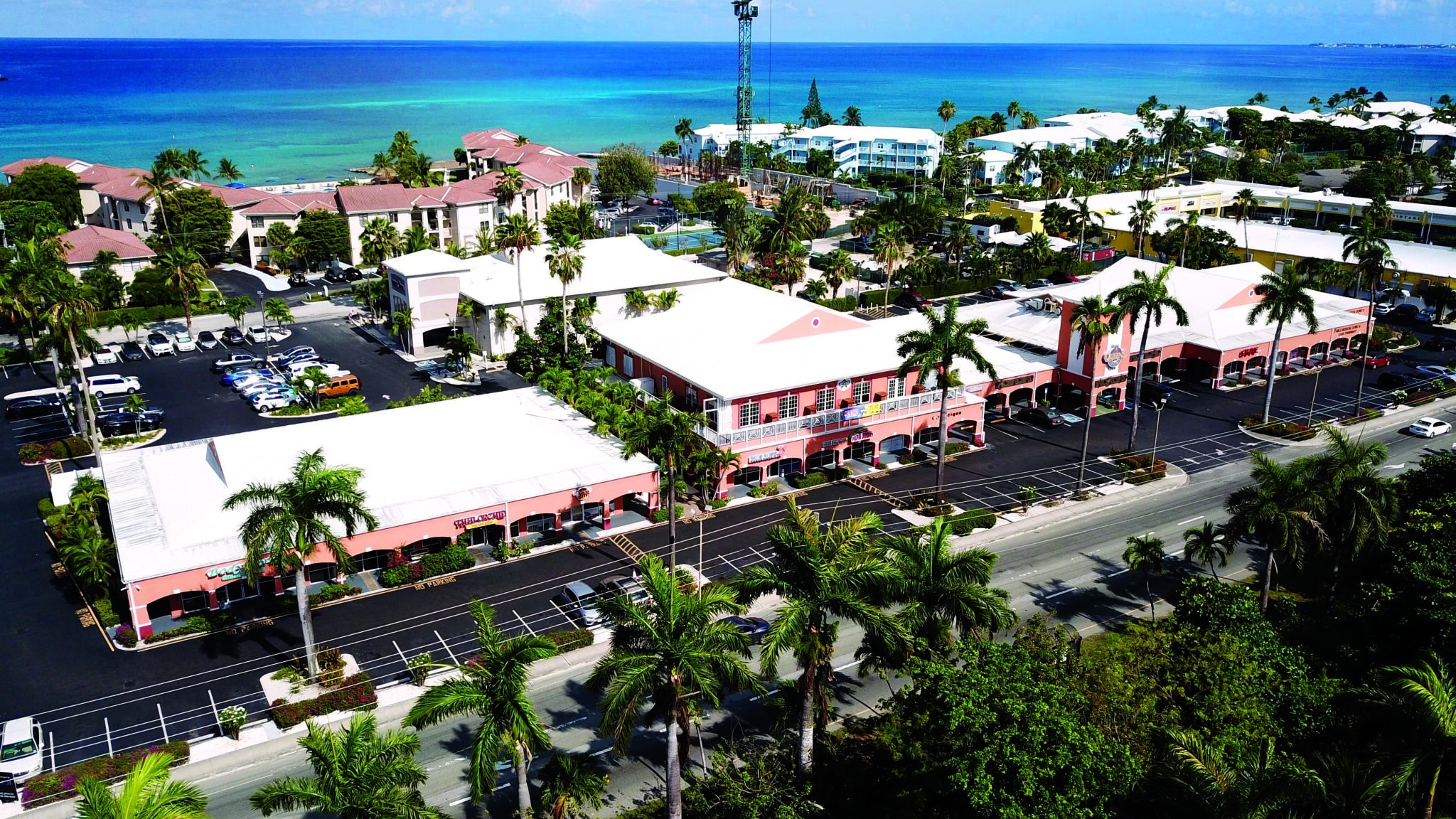 Queen’s Court Shopping Centre - Arch & Godfrey | Cayman Islands
