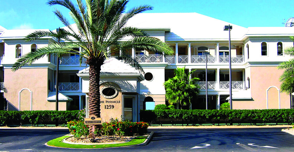 Queen’s Court Shopping Centre - Arch & Godfrey | Cayman Islands